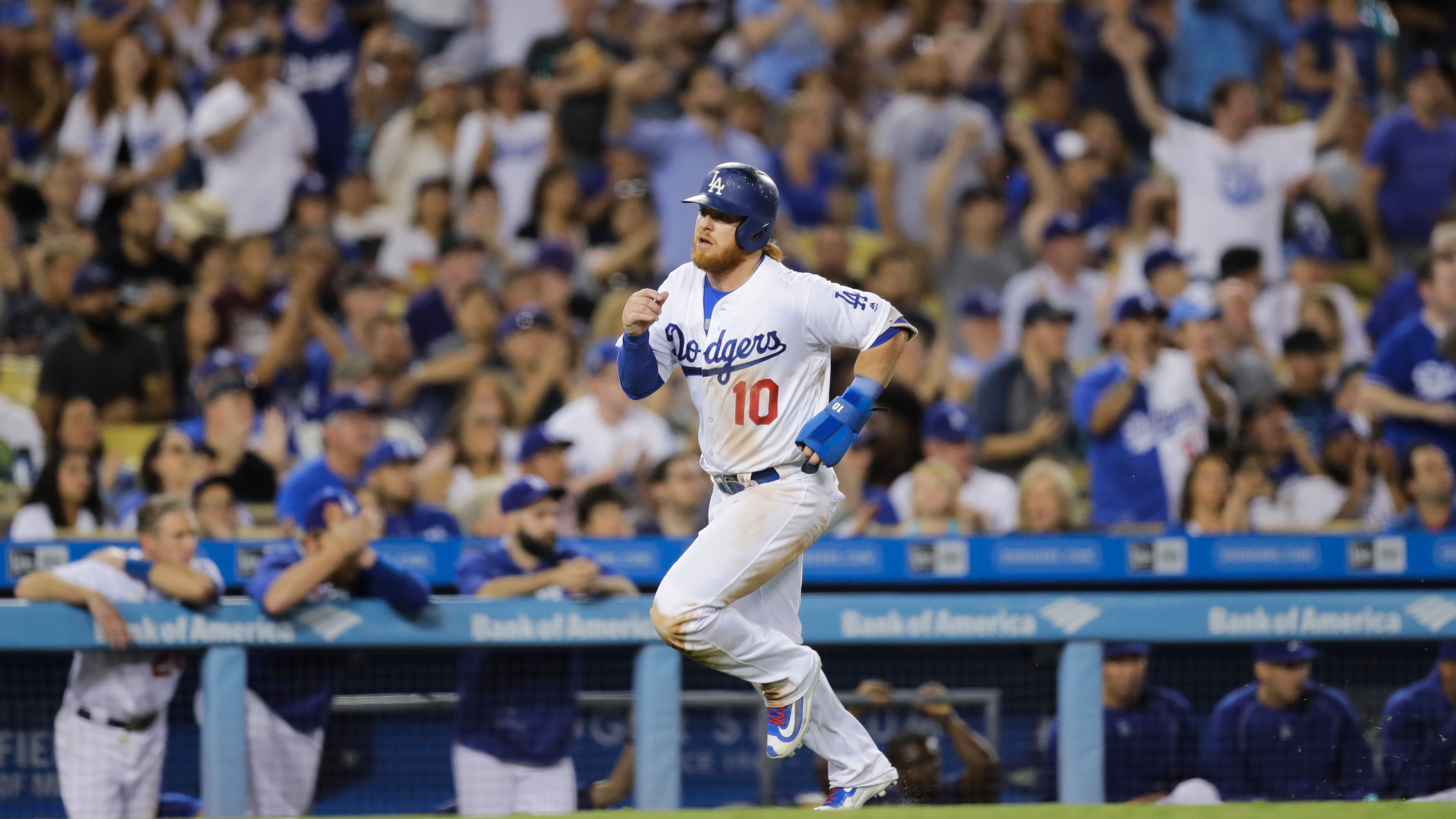 Reddick explota con grand slam y Kershaw domina a Rockies - ESPN