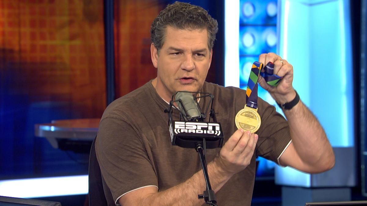 Golic proud of wife for finishing marathon - ESPN Video
