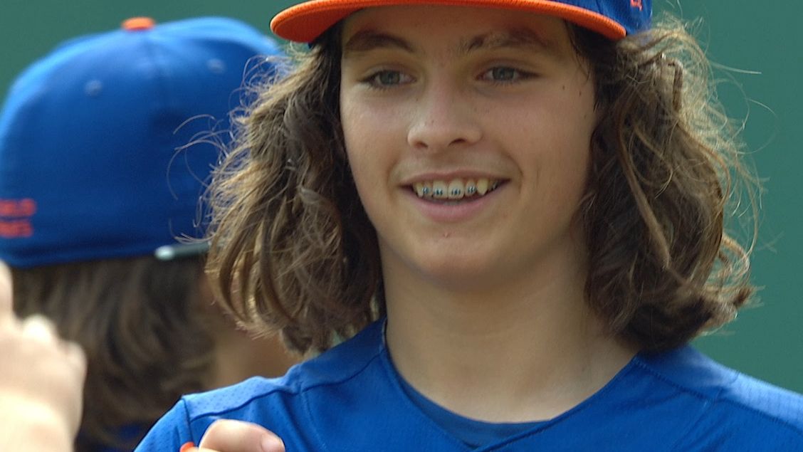 Michigan pitcher all smiles after slick bare-handed play - ESPN Video