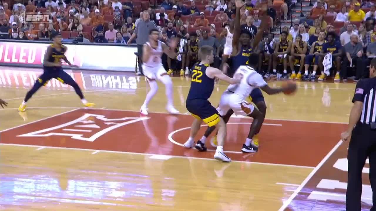 Courtney Ramey makes a sweet dish to Timmy Allen for a Longhorns basket ...