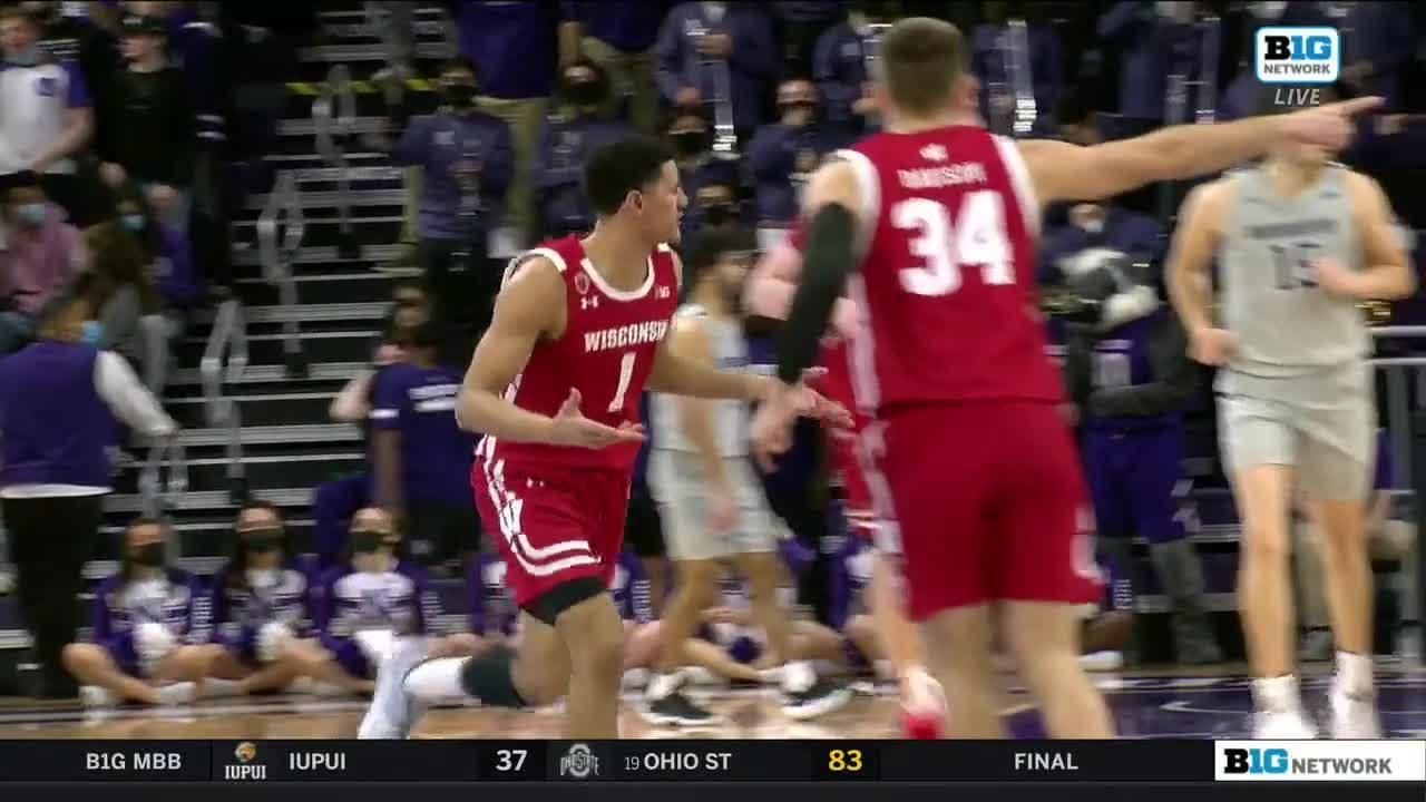 Johnny Davis banks in wild 3 for Wisconsin - ESPN Video