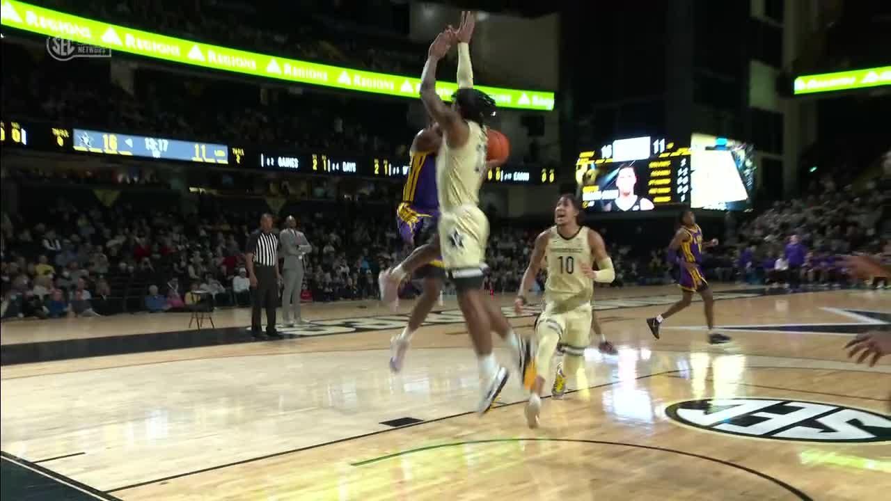 Darius Days muscles through his defender and drains the layup for LSU ...