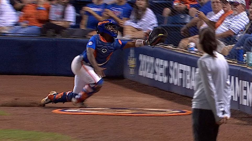 Florida catcher dives into the wall to make a stellar catch - ESPN Video