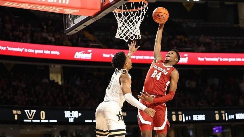 Brandon Miller doesn't let a defender get in the way of this dunk ...