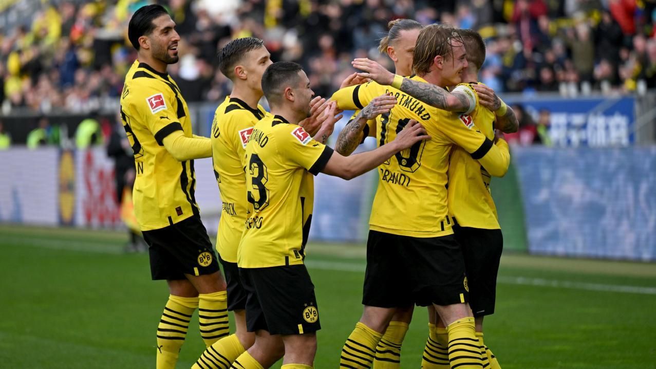 Julian Brandt flicks the set piece off his back to put Dortmund on top ...