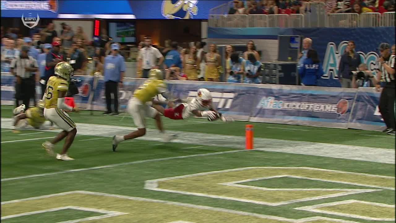 Kevin Coleman stiff-arms defender, dives to pylon for Louisville TD ...