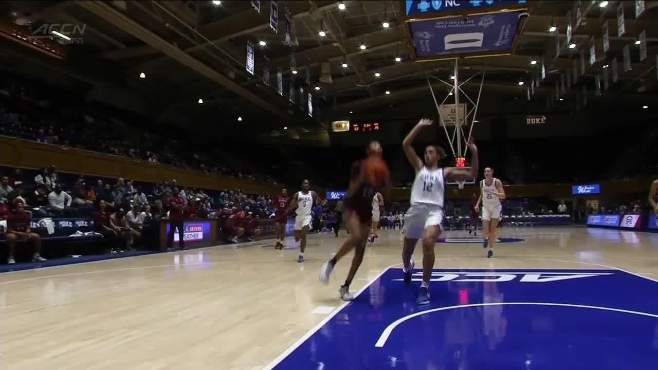 Delaney Thomas rises to block the shot - ESPN Video
