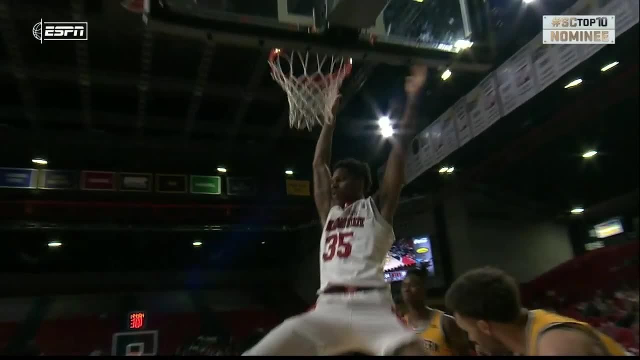 Izaiyah Nelson gets up for the beautiful slam - ESPN Video