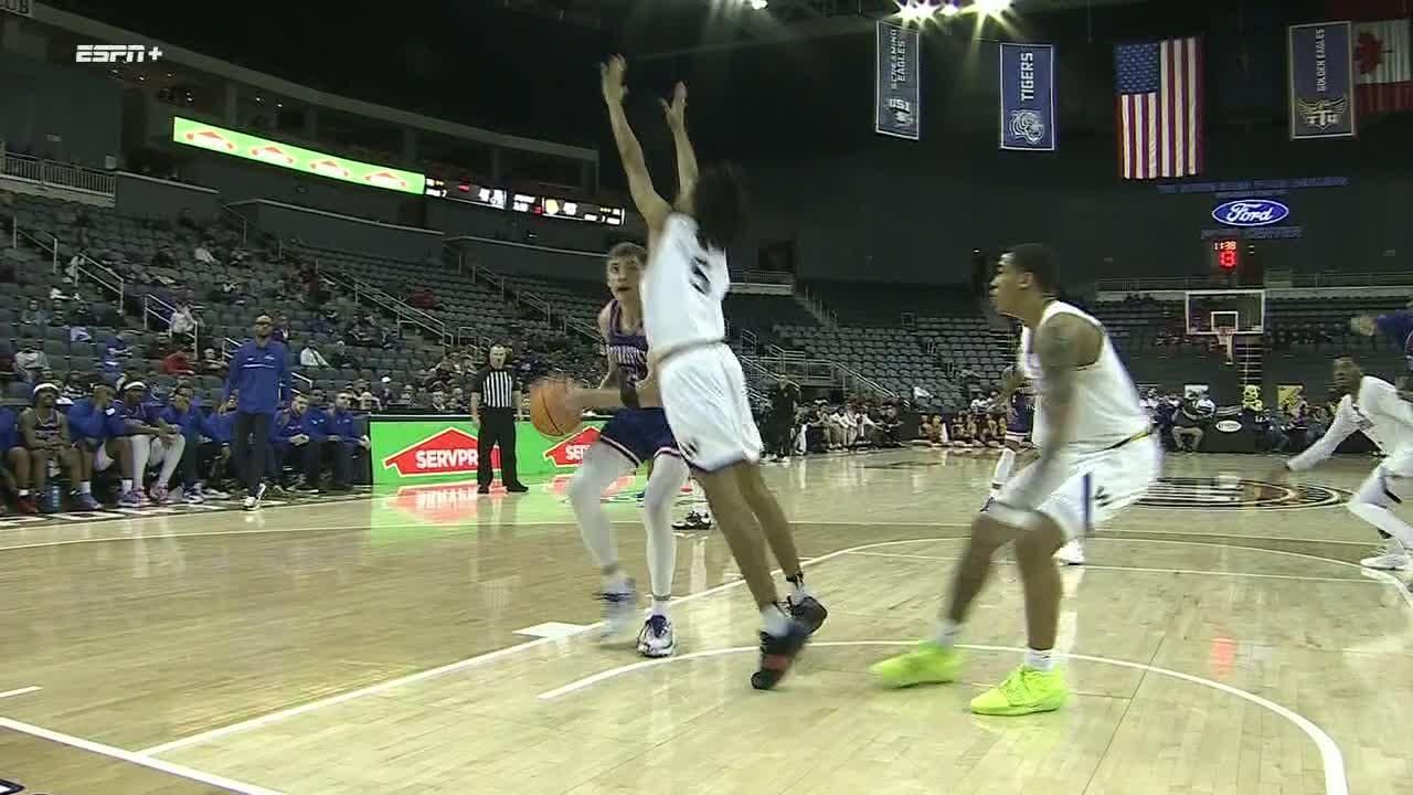 Jesiah West with the massive block at the rim - ESPN Video