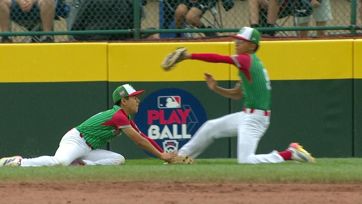 Mexico's Santiago Sotelo comes up with an impressive diving catch ...