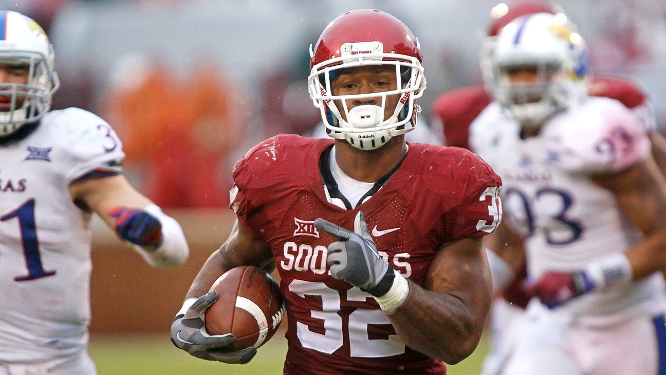 Melvin Gordon of Wisconsin Badgers congratulates Samaje Perine of ...
