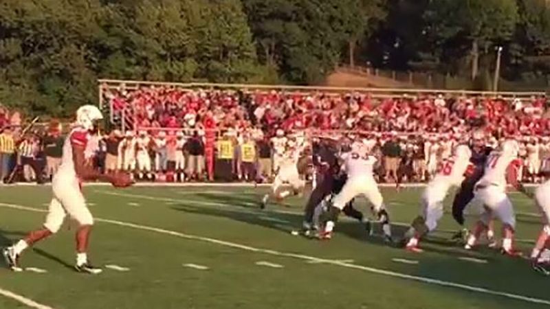 High school punt bounces off lineman