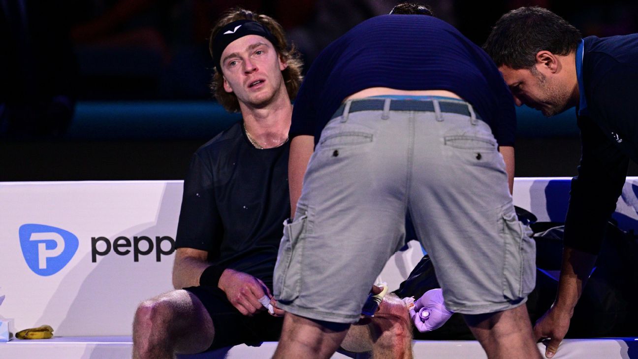 Andrey Rublev bloodies knee with racket in ATP Finals loss - ESPN