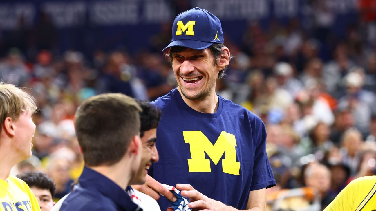 Boban Marjanović towers over Michigan student section in title game - ESPN